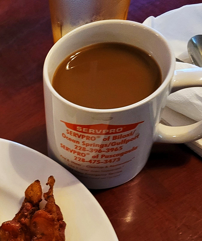 This isn't just coffee &ndash; it's morning motivation in a mug. The local business ad is a bonus &ndash; drink in the community spirit!