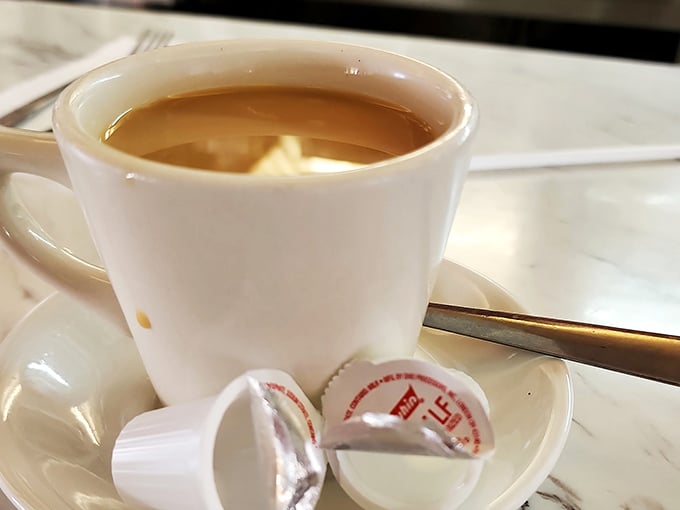 Coffee: the elixir of life. Served hot, strong, and with a side of small-town charm.