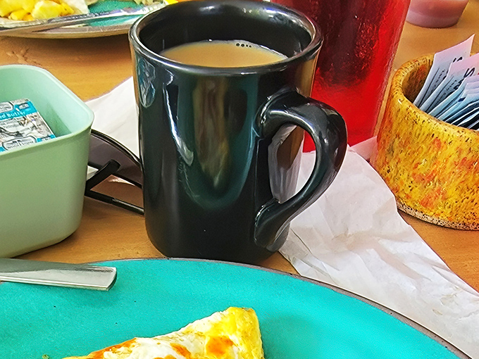 The elixir of life, served in a mug that could double as a small swimming pool. This isn't just coffee; it's morning motivation in liquid form.