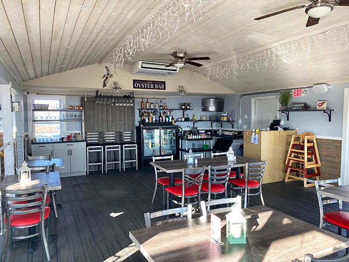 Forget fancy tablecloths &ndash; this dining area screams "come as you are, leave with a full belly and a smile." It's coastal comfort at its finest.
