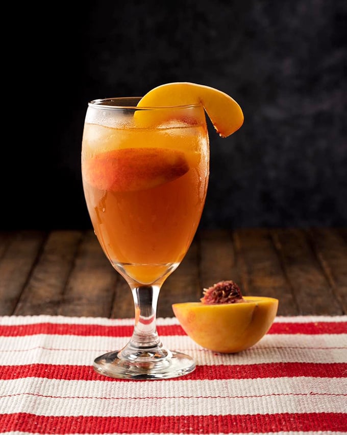 Is it a cocktail? Is it dessert? This peachy concoction is the kind of drink that makes you forget you're in a bakery.