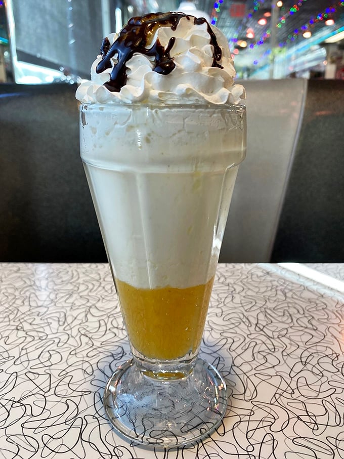 Part dessert, part work of art. This towering shake is the Eiffel Tower of dairy delights, topped with a cloud of whipped cream and a drizzle of decadence.