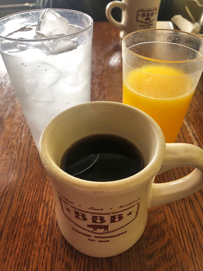 Morning fuel, three ways: coffee to wake you, OJ for vitamins, and water... well, just in case you need to dilute all that deliciousness.