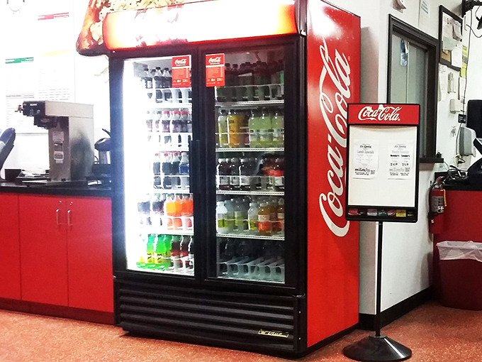 Decisions, decisions! DiCarlo's drink fridge is like a colorful oasis in a desert of pizza cravings.