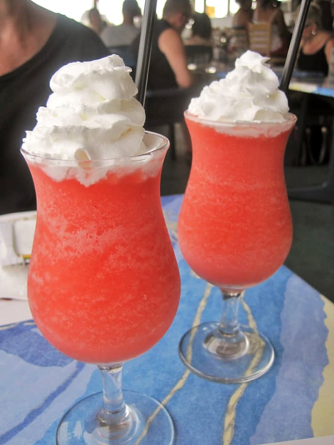 Frozen daiquiri dreams! These frosty delights are like a beach vacation in a glass, complete with a whipped cream cloud.