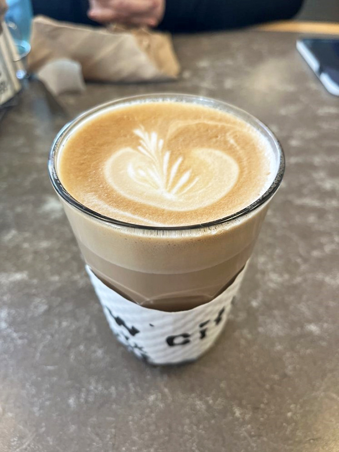 Latte art so pretty, it belongs in the Louvre. This cup of joe is serving face and flavor, warming hands and hearts one sip at a time.