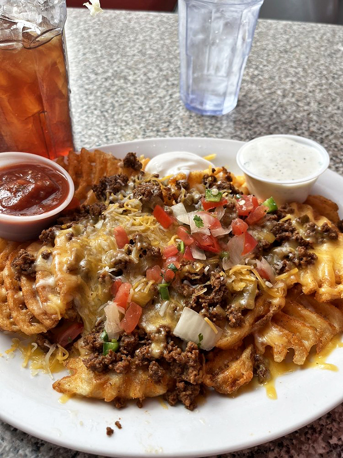 Nacho average appetizer! This mountain of cheesy, beefy goodness is the Everest of Tex-Mex indulgence. Grab a friend and start climbing.