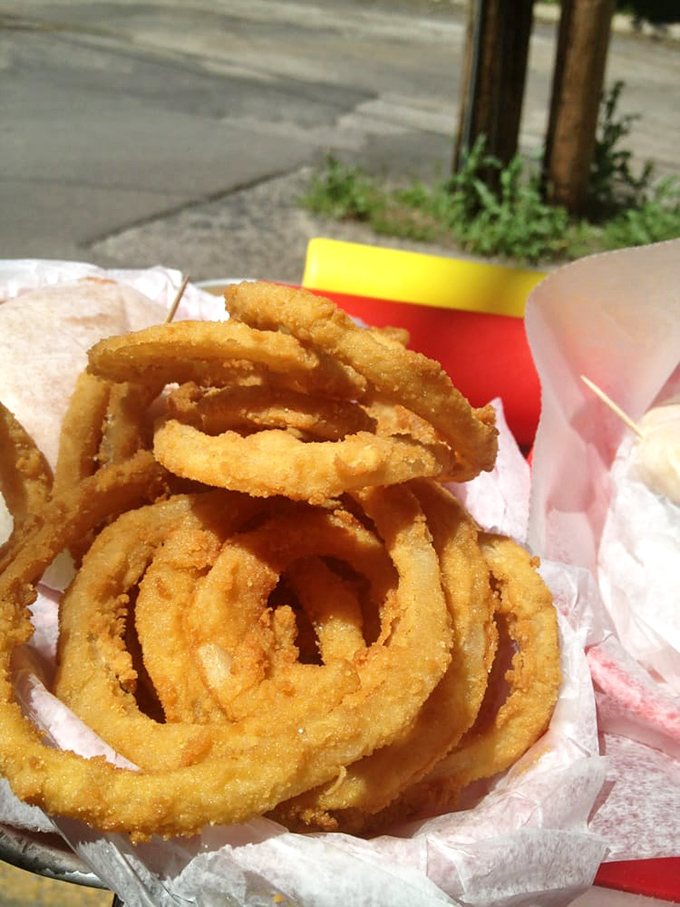 Golden rings of joy! These onion rings aren't just fried – they're crispy halos of happiness that'll make you say "Oh, yes!"