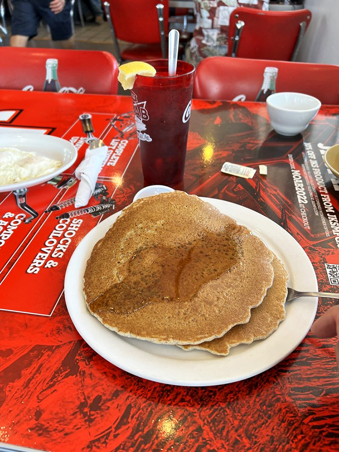 Pancakes so big, they need their own area code. These fluffy discs of joy are the perfect canvas for your syrup-pouring artistry.