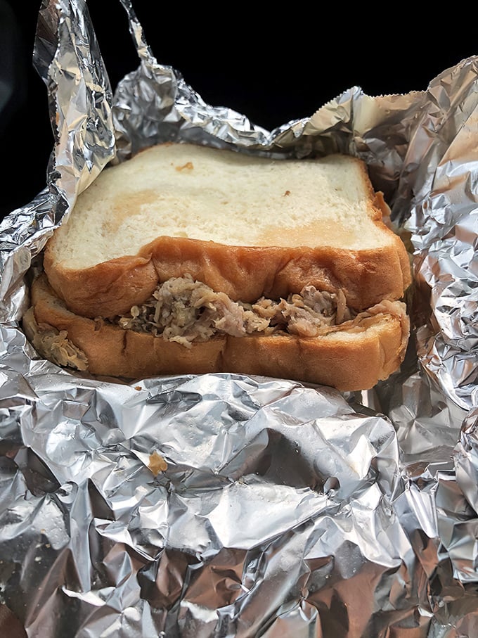 Simplicity at its most delicious! This sandwich proves that sometimes, all you need is good bread, great meat, and a total disregard for your dry-cleaning bill.