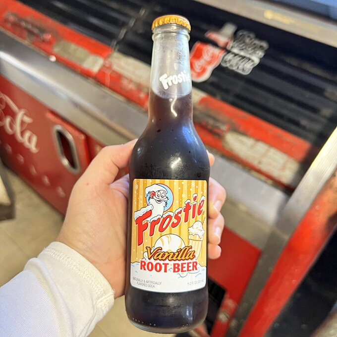 Frostie root beer - because sometimes you need a little nostalgia to wash down your burger. It's like a hug in a bottle!