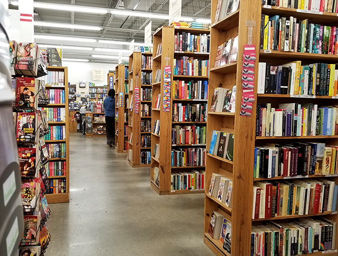 Behold, the Tetris of literature! These shelves are stacked higher than my to-be-read pile on New Year's Day.