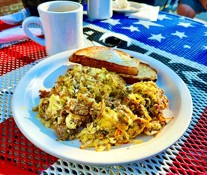 Breakfast of champions! This hearty plate is a delicious hodgepodge that'll fuel you through any adventure. Just don't plan on moving much afterward.