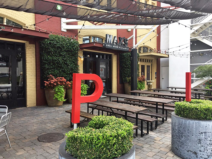 Max's patio: where "Roman Holiday" meets "Eat, Pray, Love." String lights and brick walls set the scene for pizza magic.