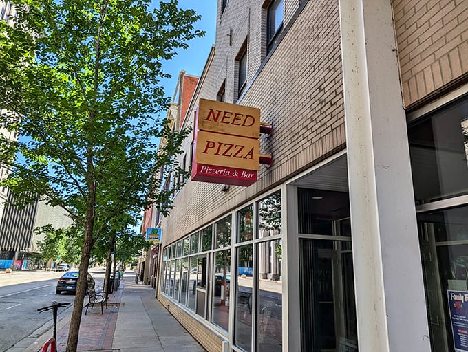 Need Pizza's honest signage asks the most rhetorical question in culinary history &ndash; because really, who doesn't?