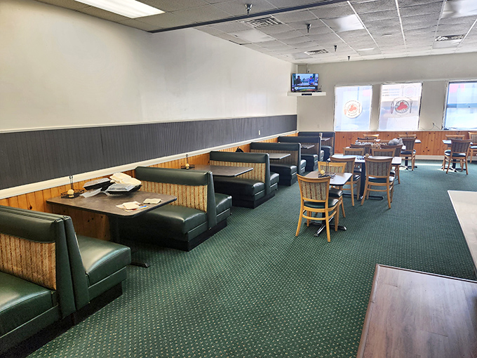 Cozy booths and no-nonsense decor at Best Steak House Plus. It's all about the steak, not the frills.