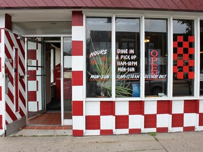 Checker Board Pizza's classic vibe: Red and white paint, with a hint of pizza perfume in the air. It's a slice of Americana, served hot and cheesy.