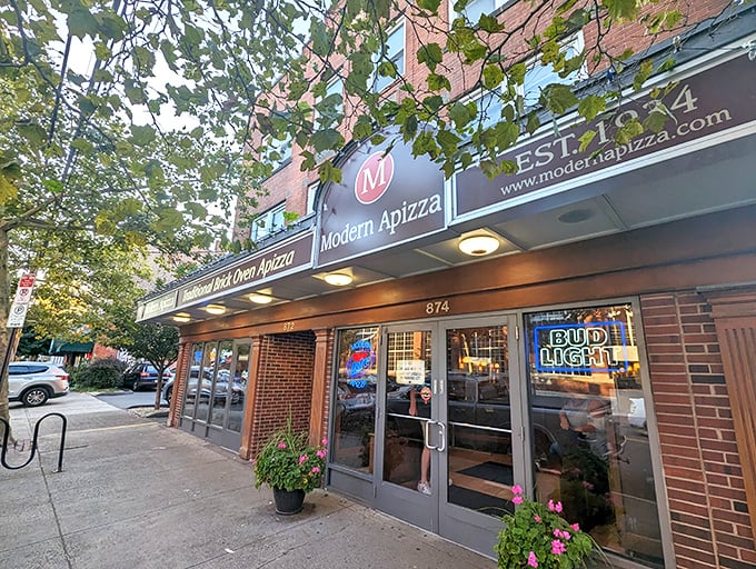 Modern's simple sign belies the complexity within. It's like a PhD in pizza, served one delicious slice at a time.