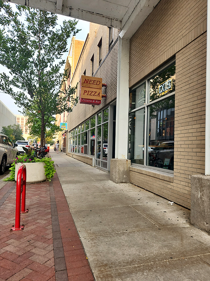 Downtown Cedar Rapids' historic buildings provide the perfect backdrop for pizza that bridges tradition and innovation with every slice.