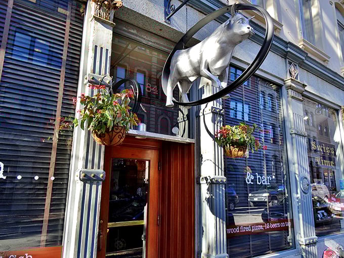 That cow sculpture isn't just for show – it's a promise of beefy delights within. The Grill Room serves up city style with country portions.