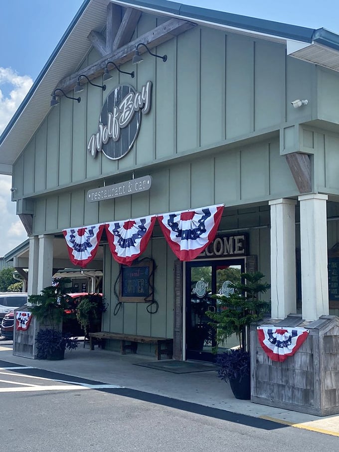 Patriotic bunting and seafood? Wolf Bay is where the Founding Fathers would've celebrated Independence Day if they had better taste in food.