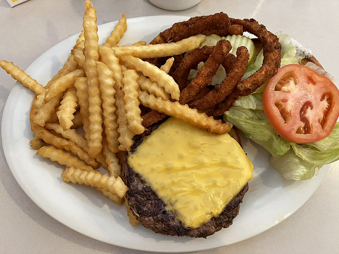 Burger bliss! This 5th Wheel beauty is stacked higher than a Maine lighthouse. Prepare for a flavor explosion in every bite.