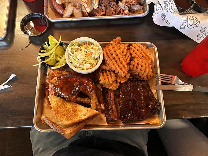 The barbecue equivalent of "why choose when you can have it all?"&mdash;a platter that solves life's toughest decisions.