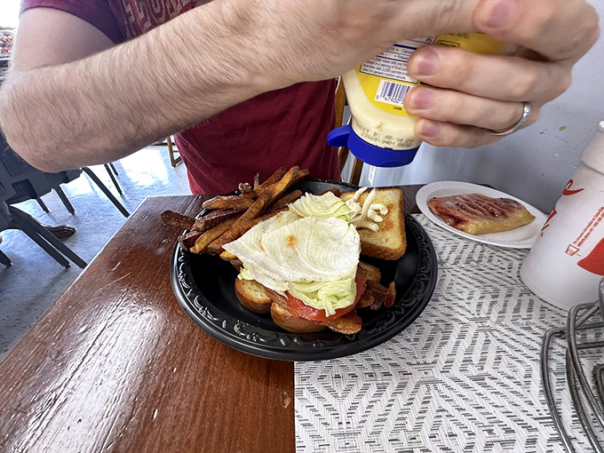 This BLT isn't just a sandwich; it's a tower of crispy, creamy, veggie-loaded deliciousness that'll make your mouth do a happy dance.