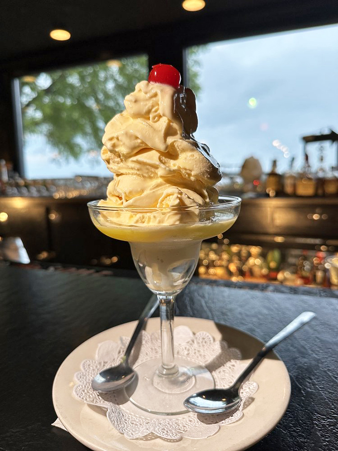 Dessert or work of art? This Banana Banshee is a towering triumph of creamy indulgence, topped with a cherry that's more than just decoration.