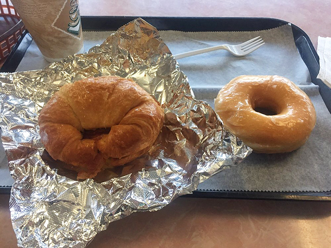 The breakfast of champions! This croissant and doughnut duo is like Batman and Robin, if Batman were flaky and Robin were glazed.