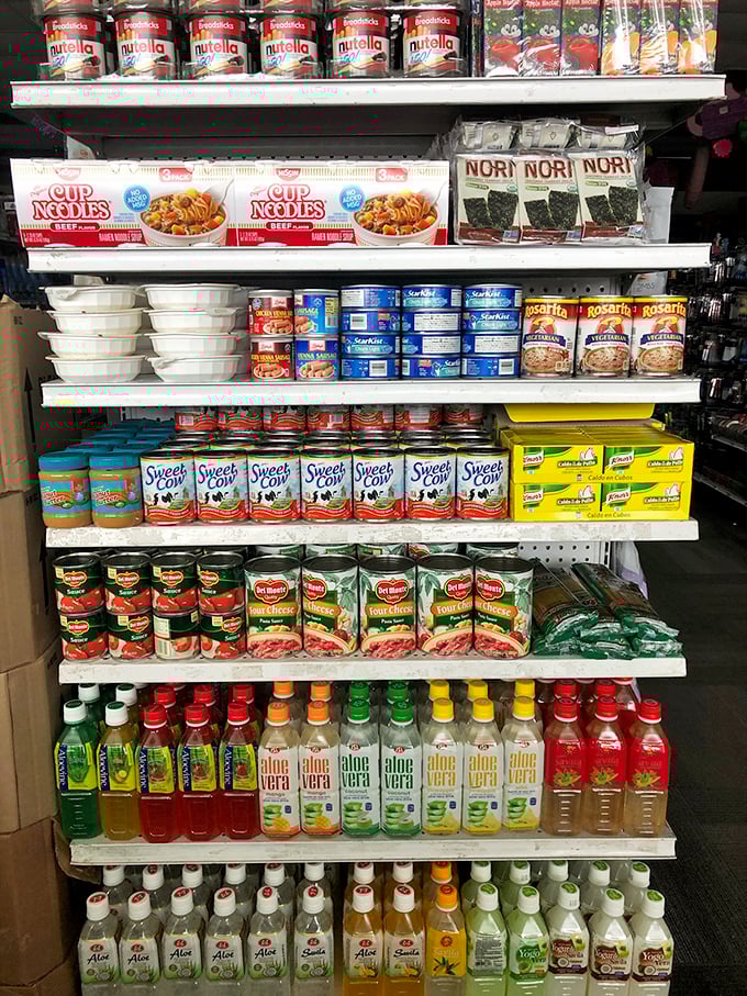 International flavors line these shelves like a United Nations of pantry staples. Nutella and nori sheets? The culinary adventure begins here!
