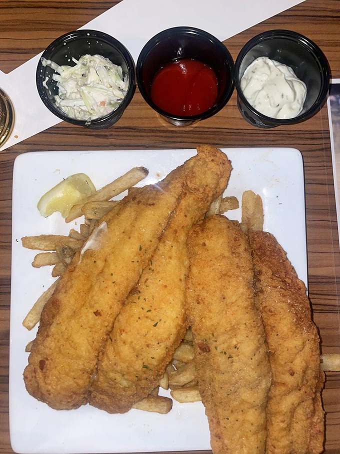 Crispy catfish and golden fries: a dynamic duo that proves sometimes the best catch isn't from the ocean at all.