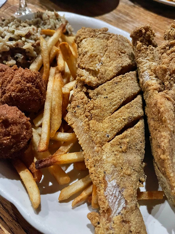 This catfish didn't just get fried, it got a golden ticket to flavor town. Crispy on the outside, tender on the inside&mdash;seafood perfection!