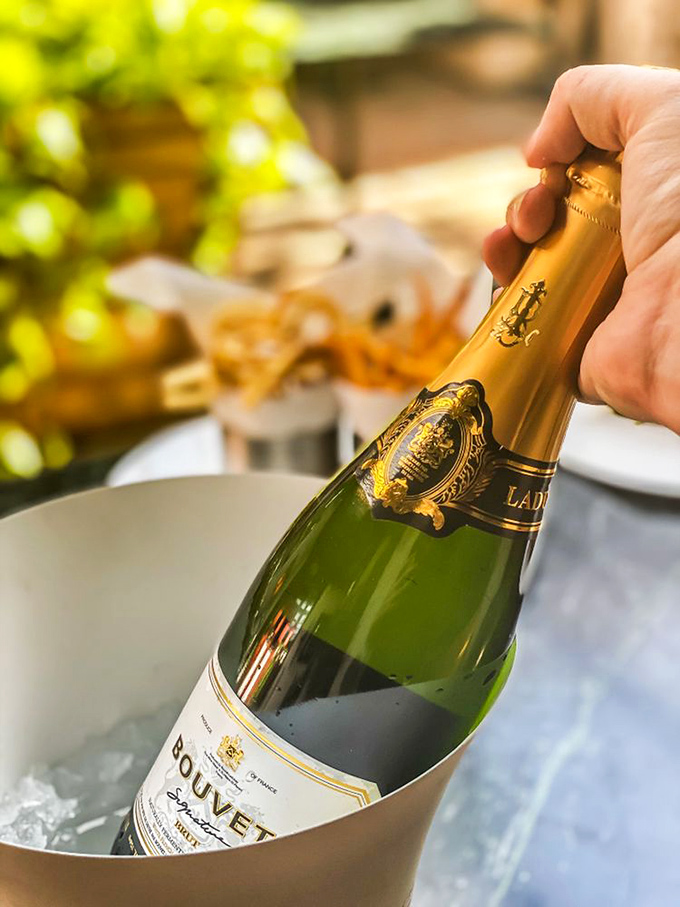 Pop the cork and let the good times roll! Nothing says "treat yourself" quite like a chilled bottle of bubbly at Zinc Bistro.