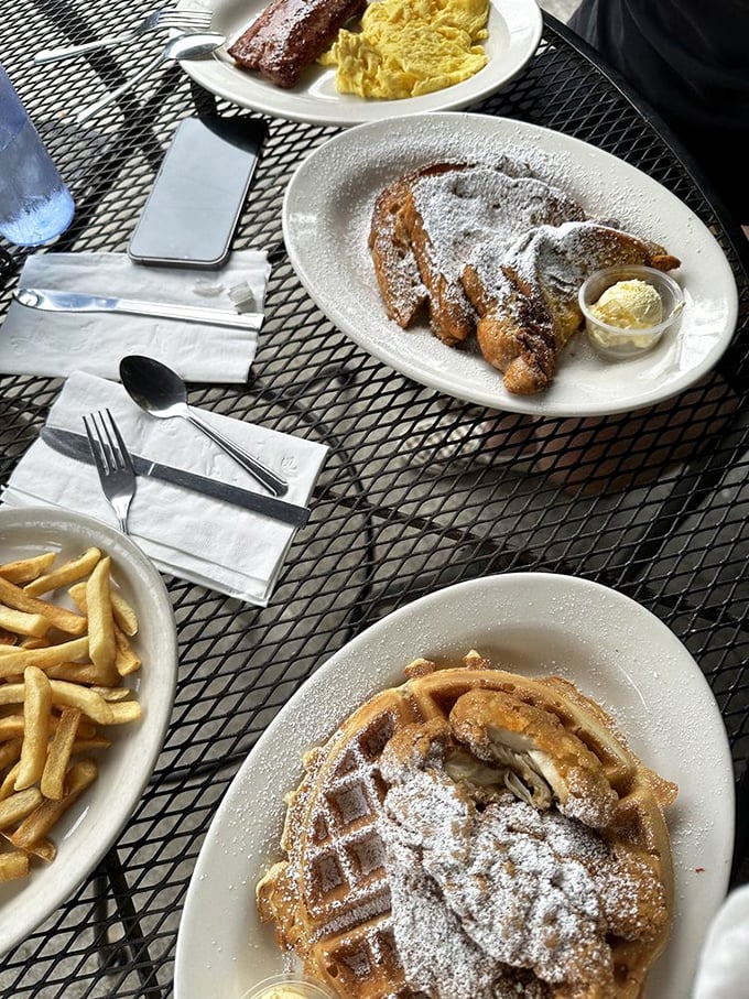 Breakfast indecision? Problem solved! This spread of chicken and waffles, French toast, and fries covers all the bases.