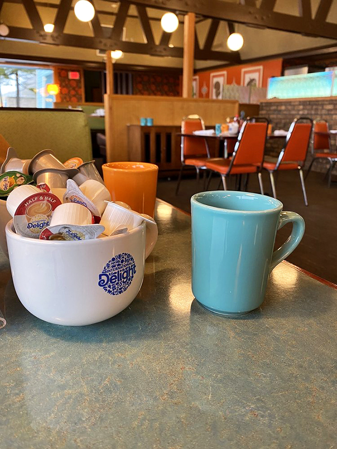 Coffee: because adulting is hard. This cozy corner promises a caffeine fix and a side of small-town charm.