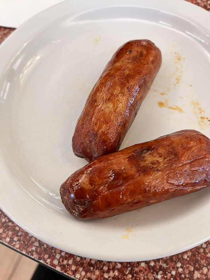 These sausages look so perfectly grilled, they could make a vegetarian question their life choices. Breakfast's MVP right here.