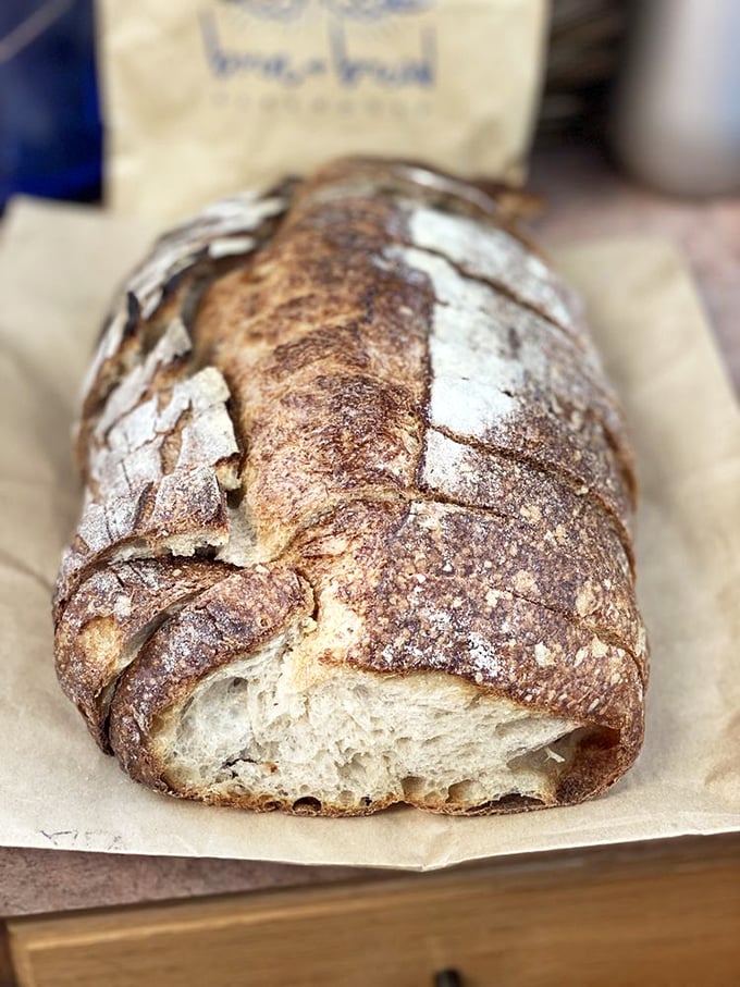 If this loaf were any more rustic, it'd be wearing overalls. Crackly crust, tangy interior &ndash; bread's answer to country music.