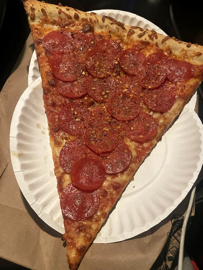 Double the pepperoni, double the fun! This slice has more meat than a deli counter during lunchtime rush.