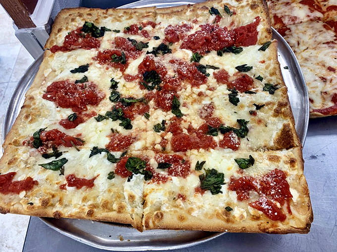 Grandma's pizza: proof that wisdom comes with age. Each bite is like a warm hug for your mouth.