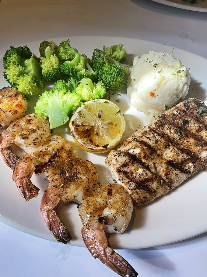 Shrimp so perfectly grilled, they could win a beauty pageant. And that mashed potato sidekick? It's the unsung hero of the plate.