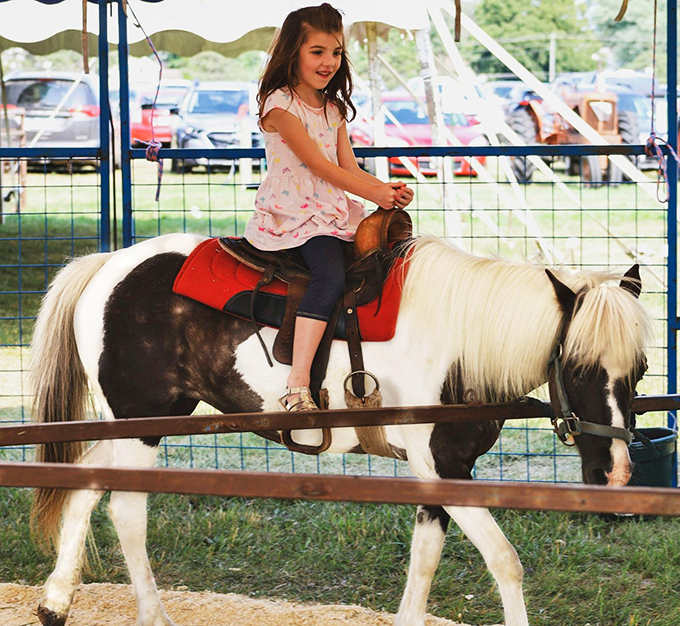 Giddy up, partner! Nothing says "old-timey fun" like a pony ride. Just don't expect to gallop off into the sunset on this gentle steed.