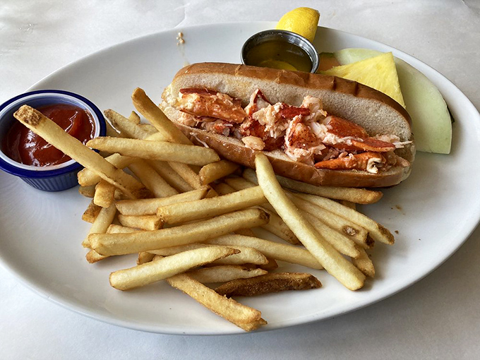 The lobster roll of your dreams! It's so packed with succulent meat, you'll wonder if they've been arm-wrestling lobsters in the kitchen.