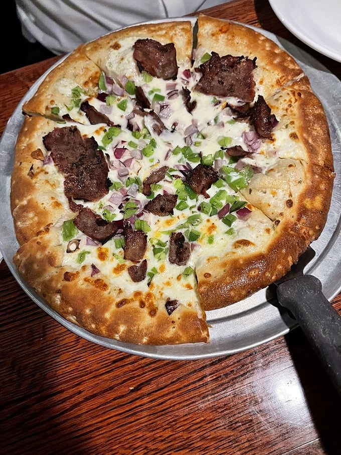 Alfredo with beef: A creamy, dreamy canvas painted with savory strokes. It's like a cow jumped into a pool of Alfredo and we're all invited to dive in.