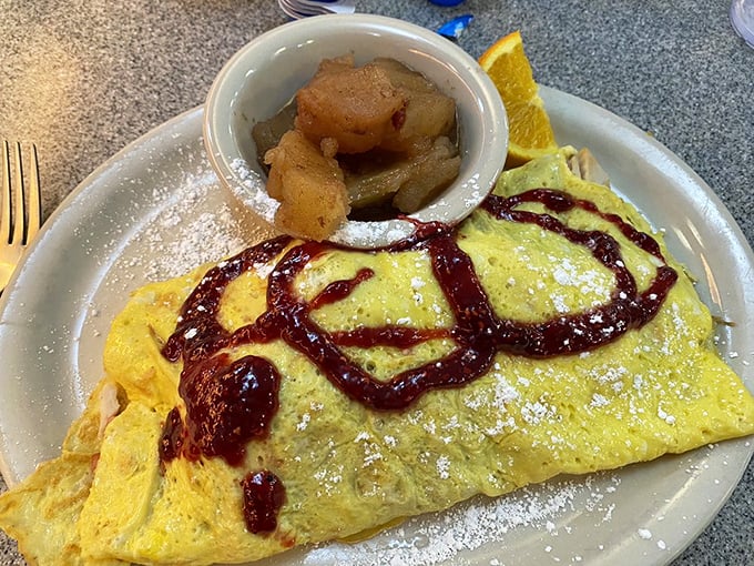 Egg-cellence personified! This omelet is packed with more goodies than Santa's sleigh on Christmas Eve.
