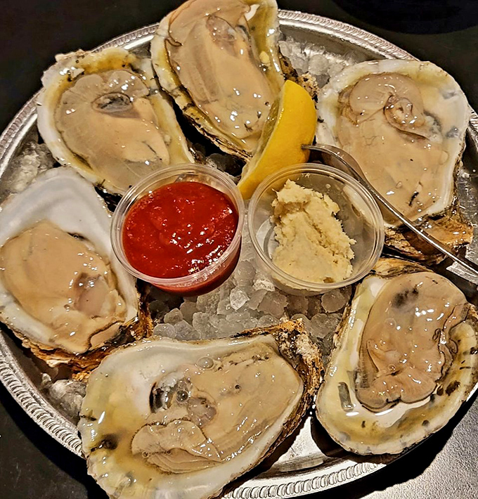 Oysters on ice, looking twice as nice! These briny beauties are just waiting to be your catch of the day.