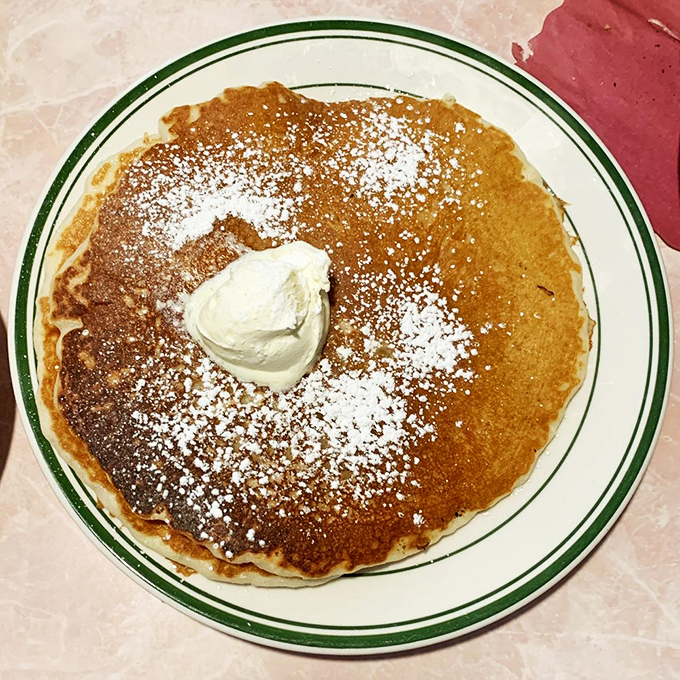 Pancake or edible frisbee? This golden disc of deliciousness is so big, it might just need its own area code. Maple syrup sold separately (but highly recommended).