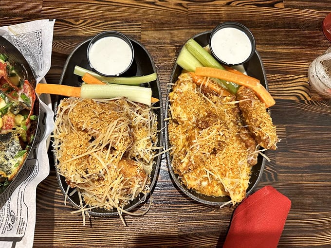 These aren't just wings&mdash;they're crispy, Parmesan-dusted flavor bombs served with cooling dips and fresh veggies for guilt management.