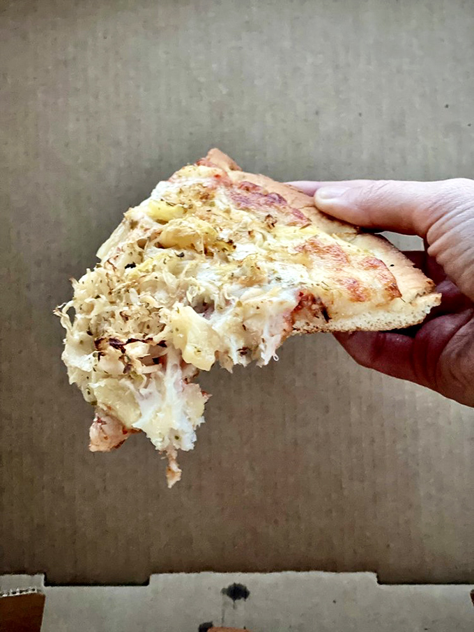 The "Odd Couple" of toppings: pineapple and sauerkraut. It's the pizza equivalent of a sweet and sour German luau!