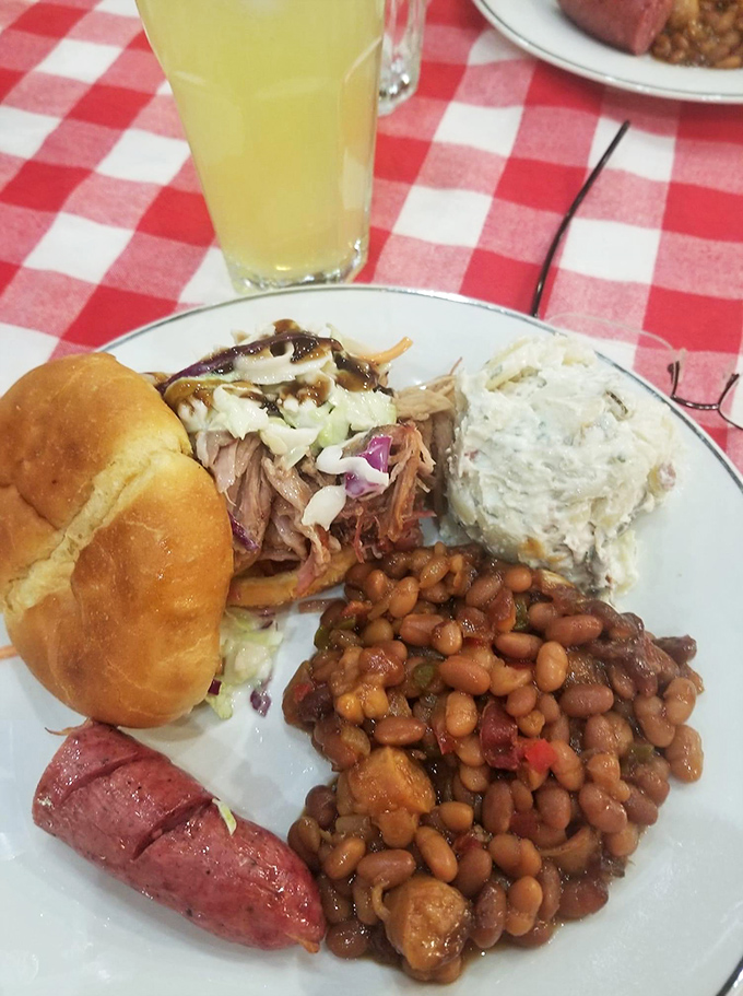 A pulled pork sandwich that's dressed to impress. It's like a hug for your taste buds, with a side of pure comfort.